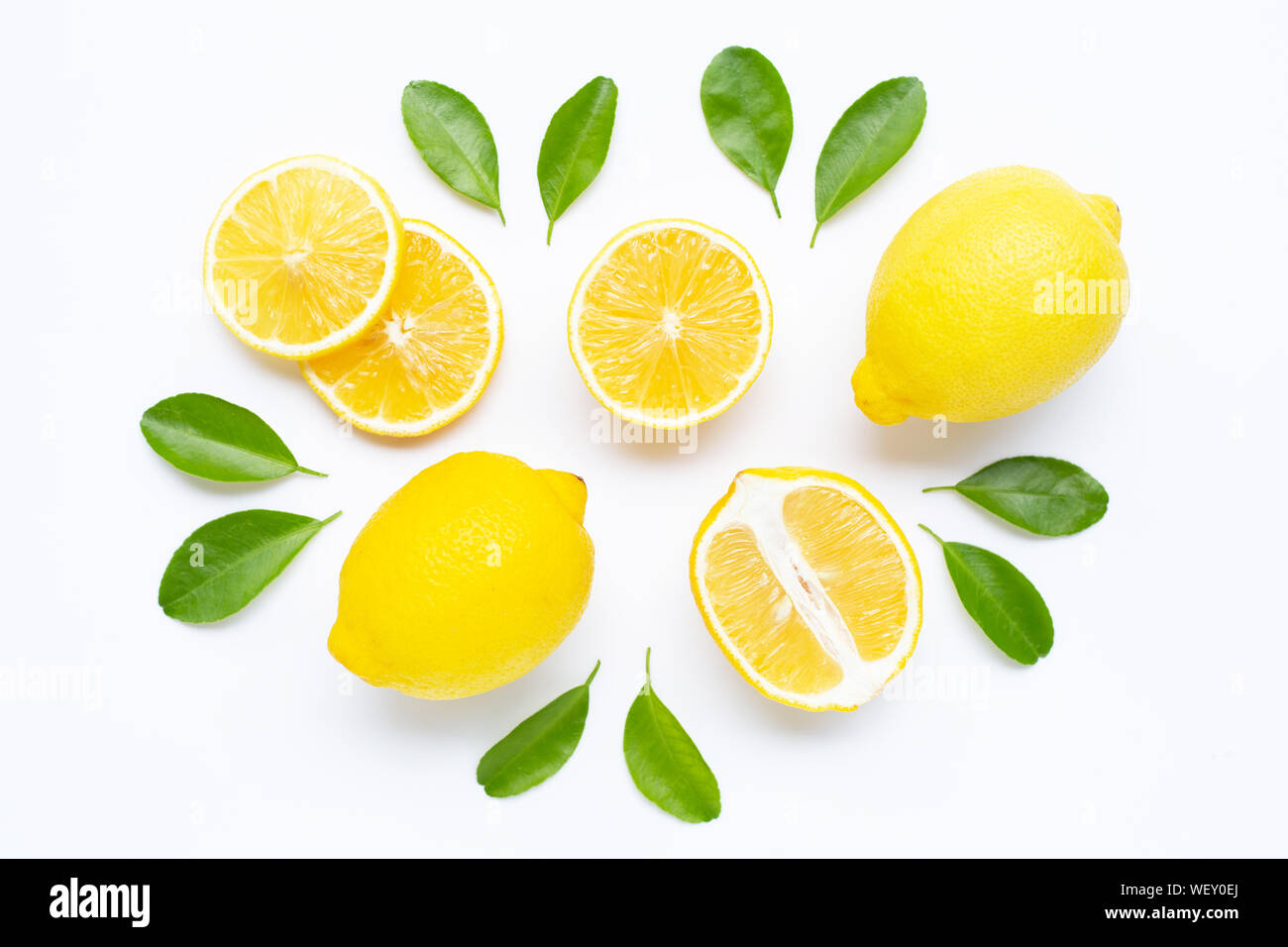 lemon and slices with leaves isolated on white background Stock Photo ...