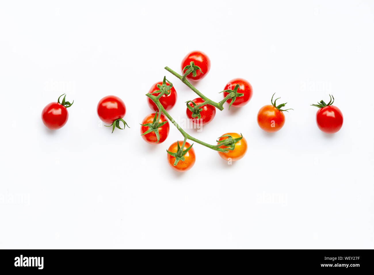 Fresh tomatoes isolated on white background. Top view Stock Photo - Alamy