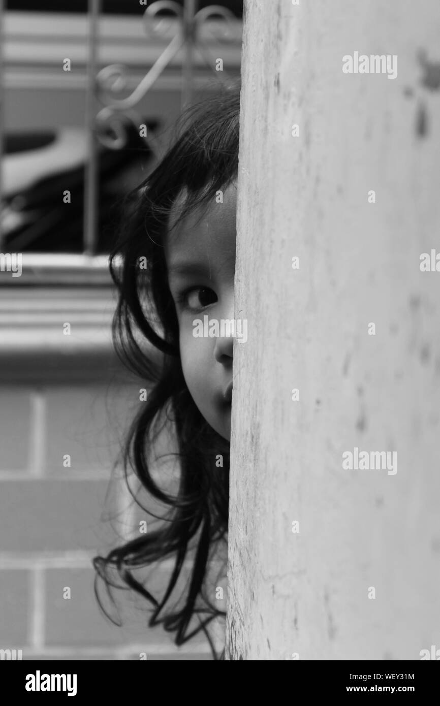 Hiding girls hi-res stock photography and images - Alamy