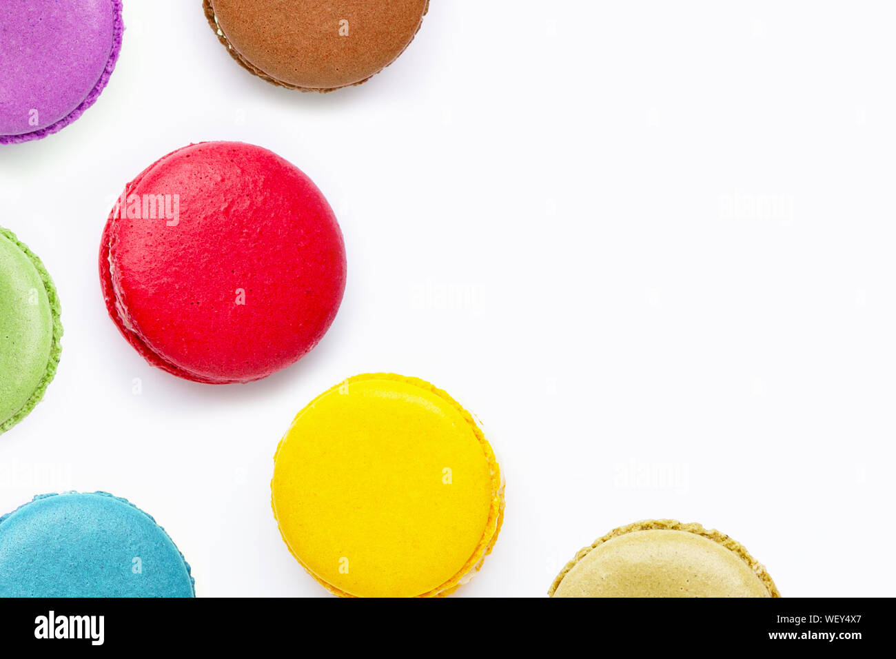 Colorful macarons isolated on white background Stock Photo - Alamy