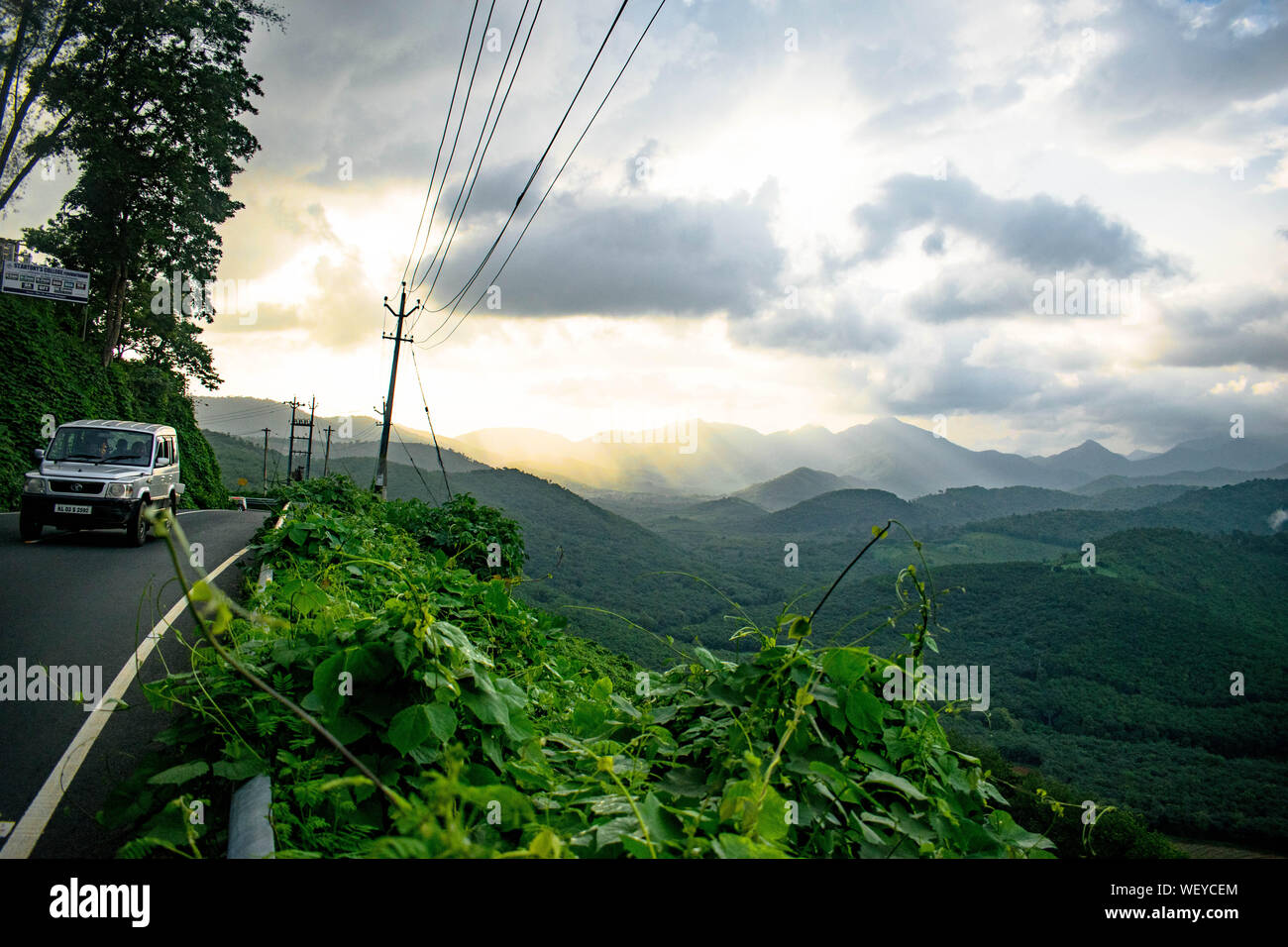 Great green mountain ranges. Peaks surrounded by green plants and a ...