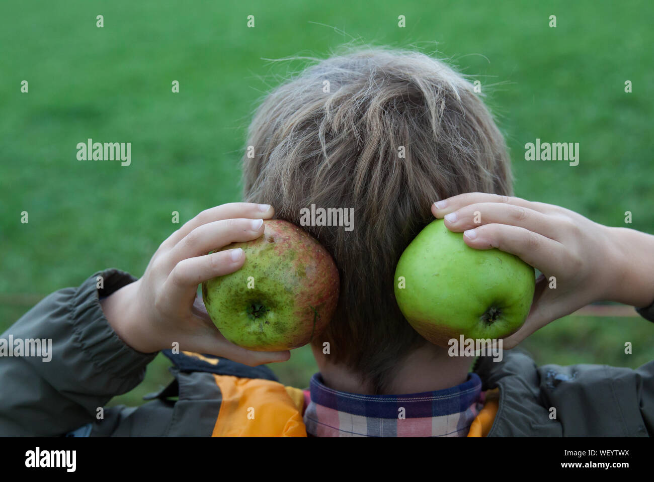 Boy apple head hi-res stock photography and images - Alamy