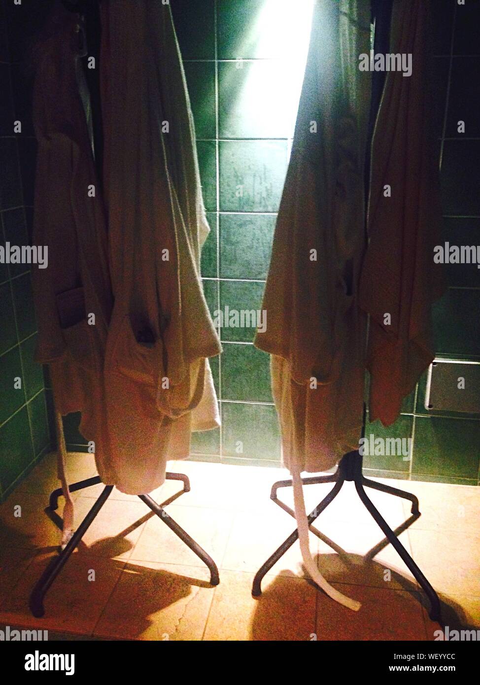 Bathrobes Hanging High Resolution Stock Photography and Images - Alamy