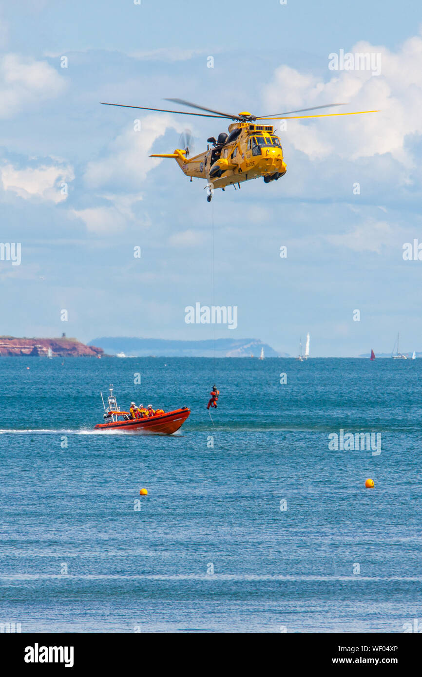RAF Sea King Helicopter Lowering Crewman and RNLI Atlantic 85 Class ...