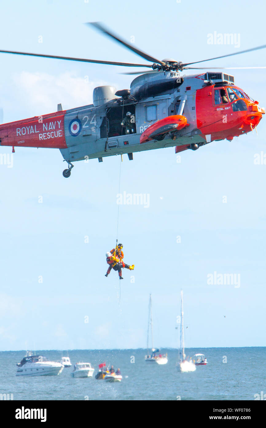 Royal Navy Sea King Helicopter Winching Casualty Stock Photo - Alamy