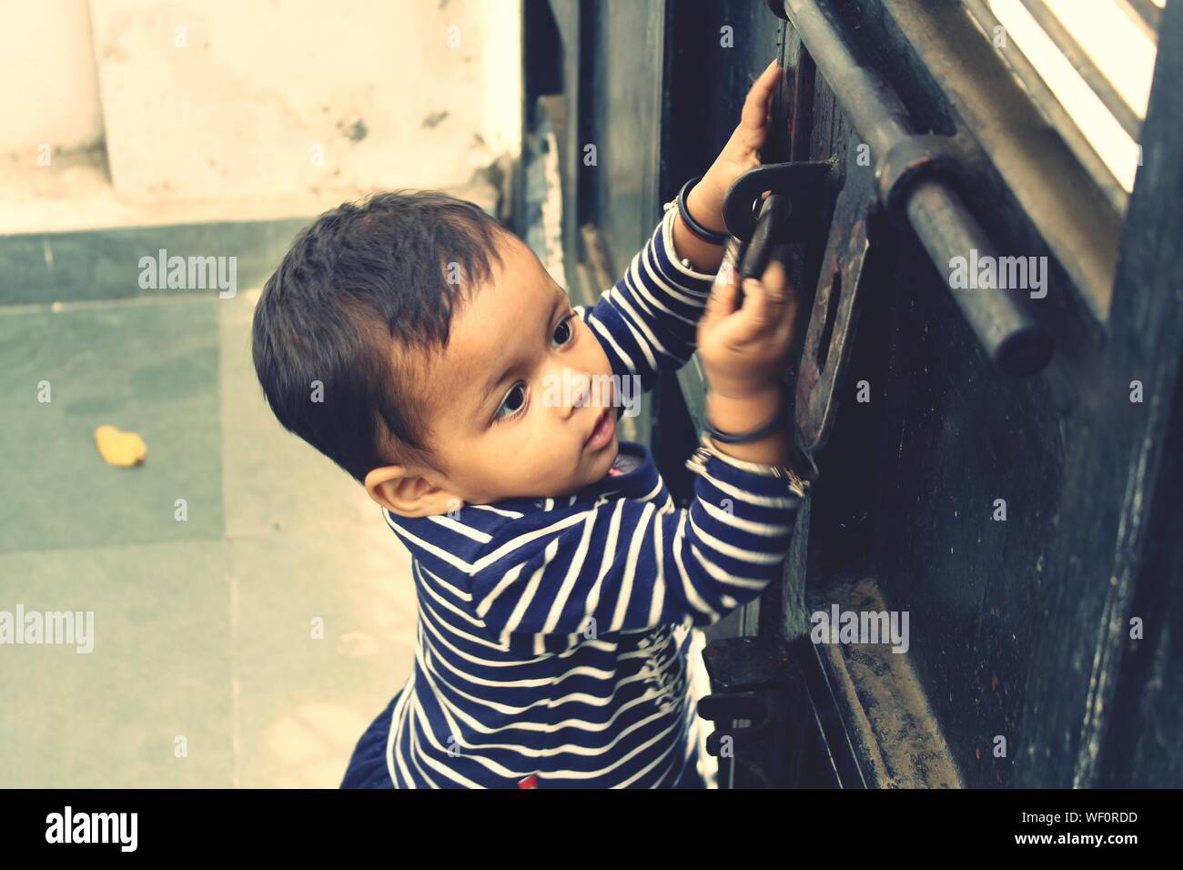 Person opening gate hi-res stock photography and images - Alamy