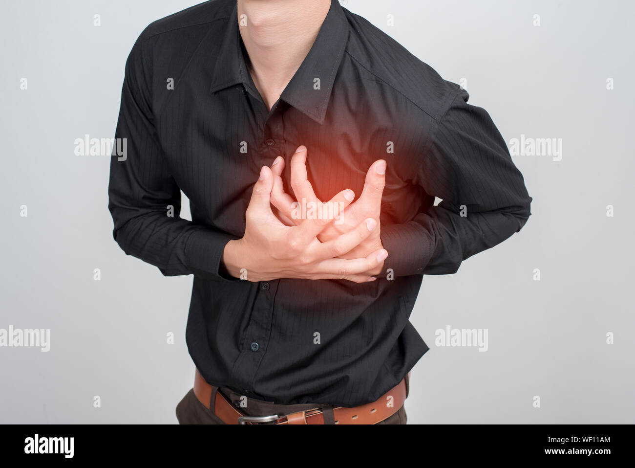 Man clutching chest hi-res stock photography and images - Alamy