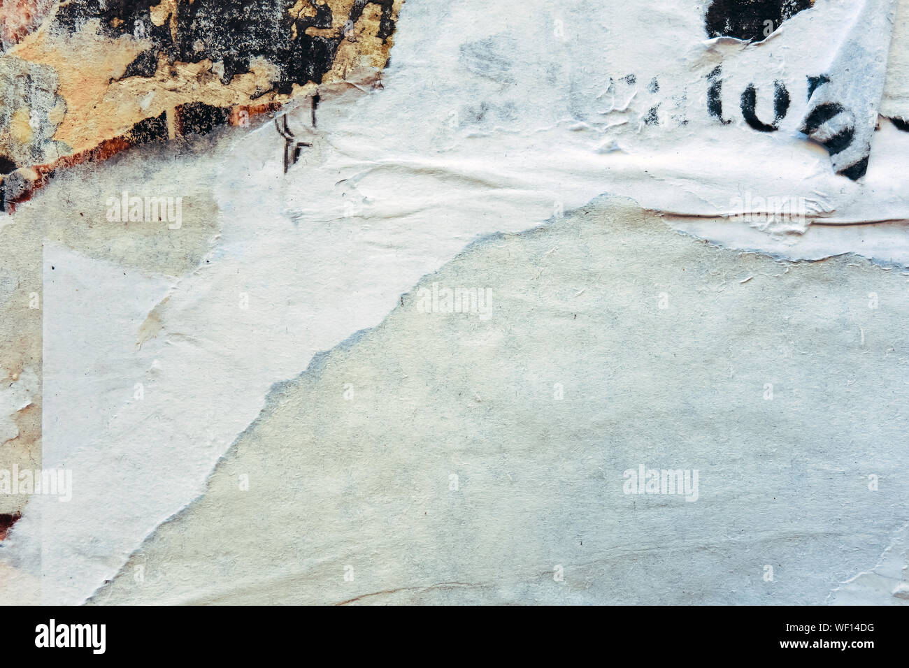 Torn poster on wall hi-res stock photography and images - Alamy