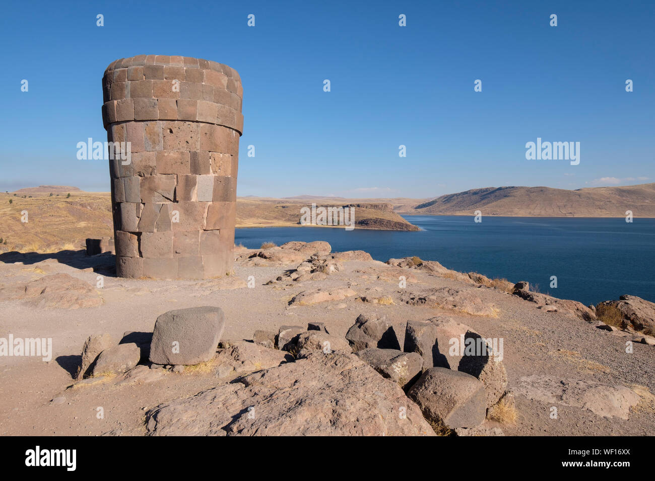 Impressive pre-Inca burial tower called chullpa with the Lake Umayo in ...