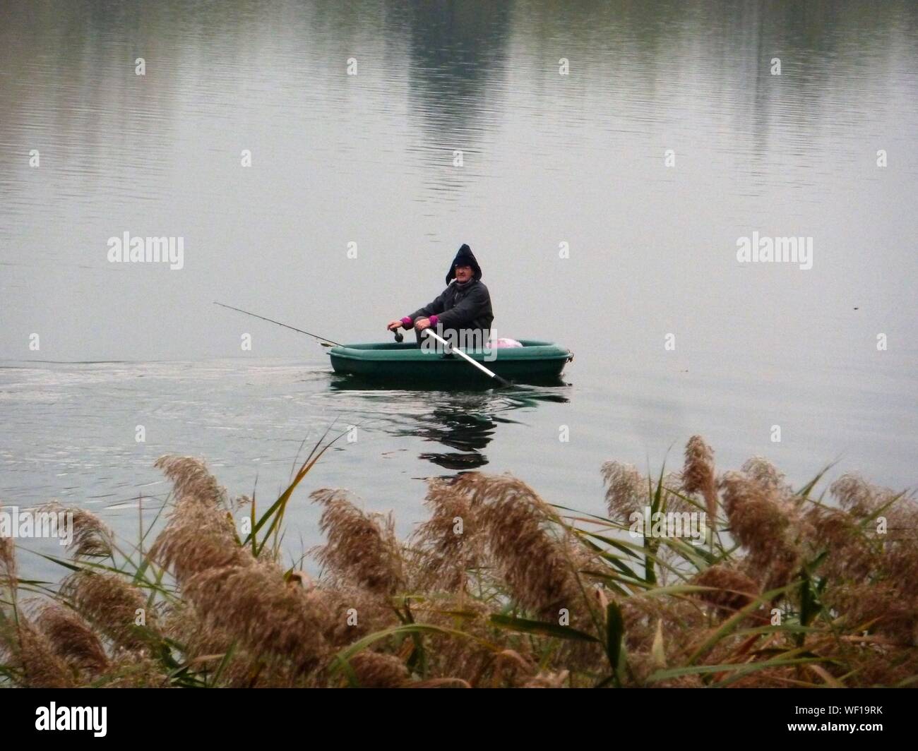 Man riding boat hi-res stock photography and images - Alamy