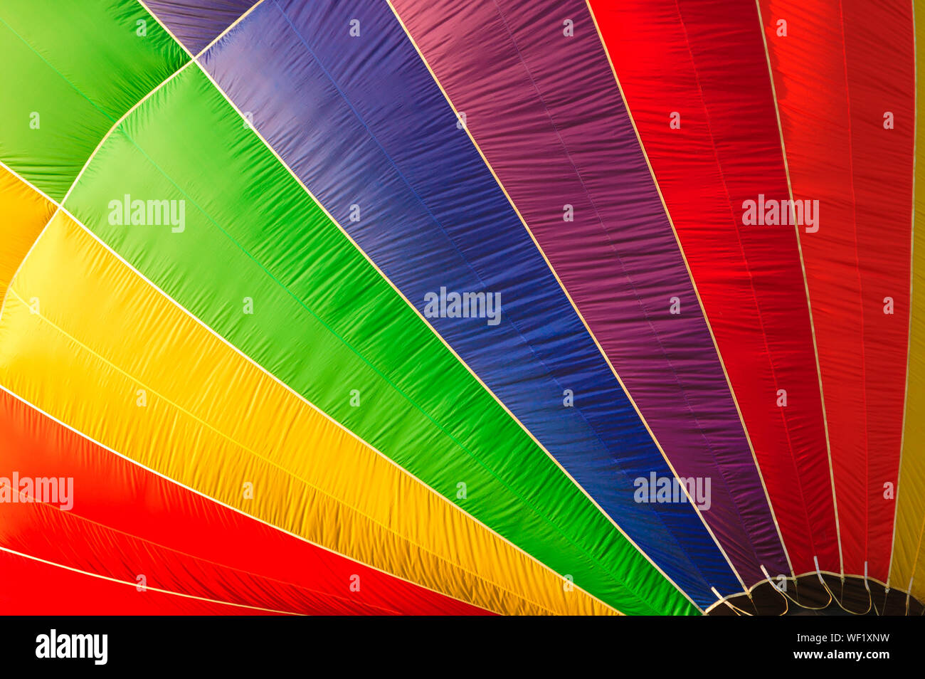 Closeup of a hot air balloon getting inflated Stock Photo - Alamy