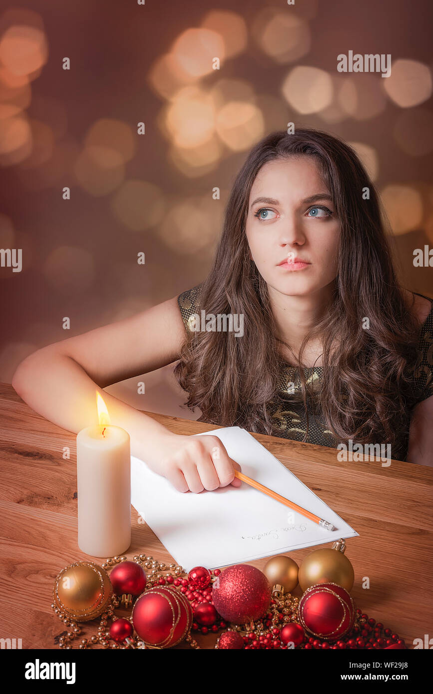 Woman burning paper flame hi-res stock photography and images - Alamy