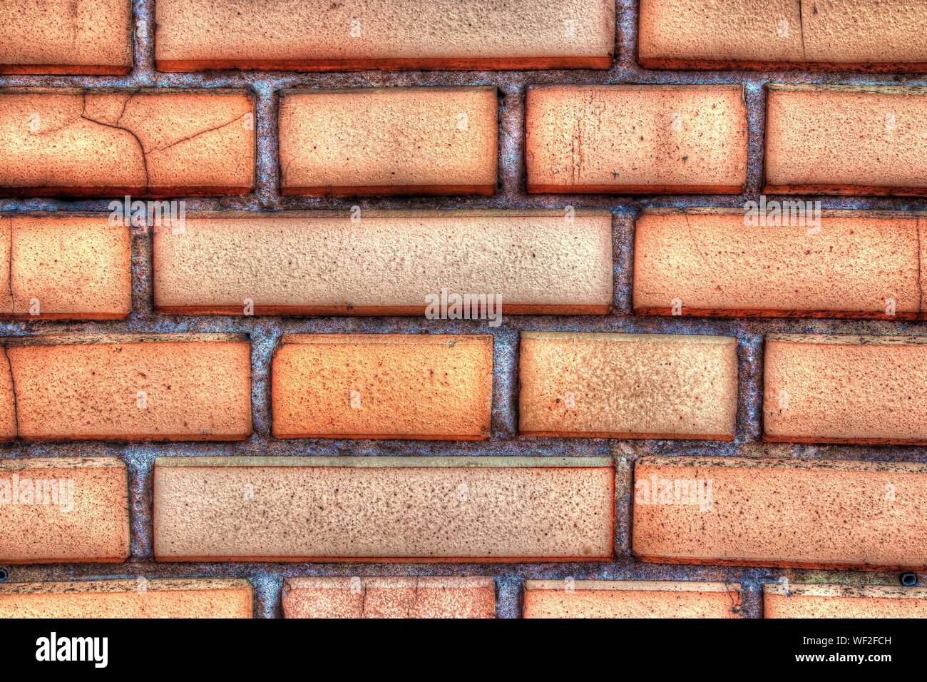 Very detailed texture of yellow brick walls on aged and weathered ...