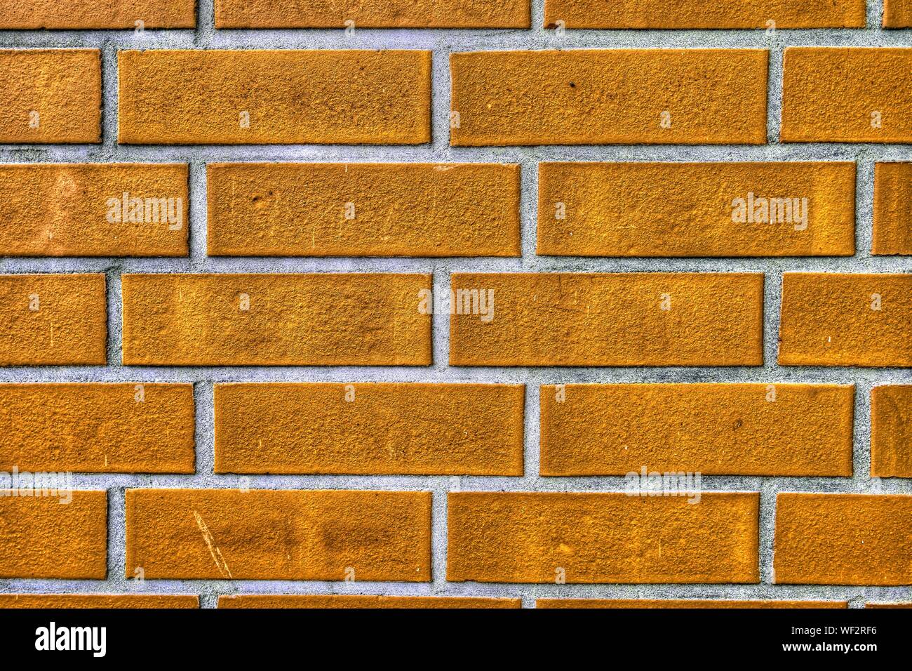 Very detailed texture of yellow brick walls on aged and weathered ...