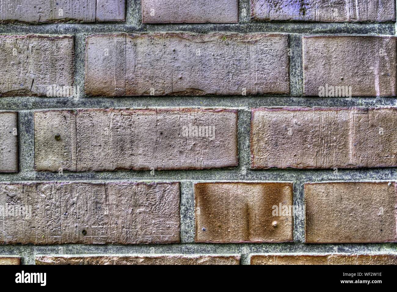 Very detailed texture of yellow brick walls on aged and weathered ...