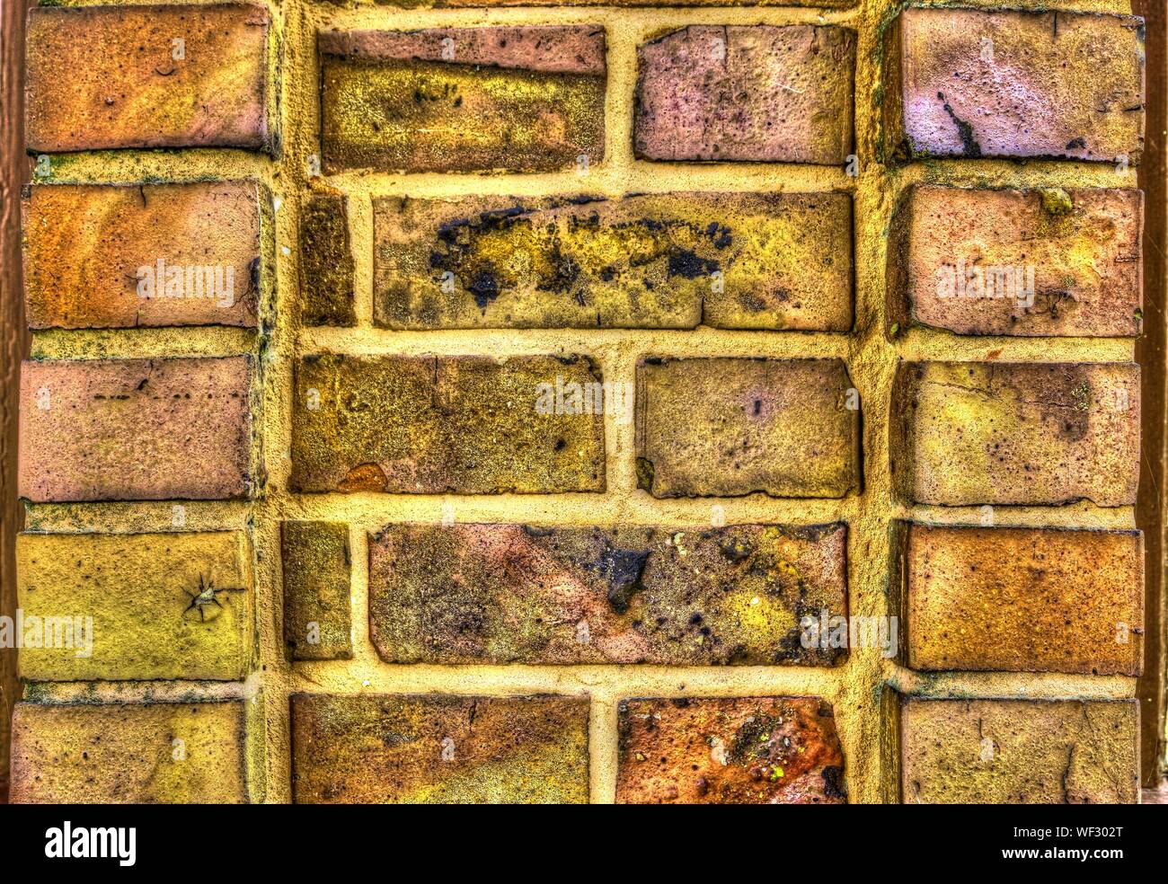 Very detailed texture of yellow brick walls on aged and weathered ...