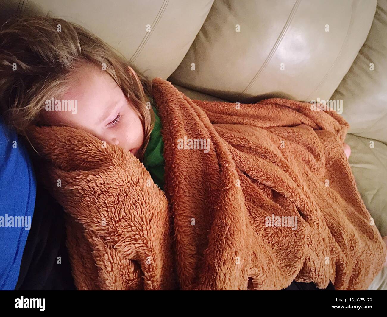 Young Child Lying Down Stock Photo - Alamy