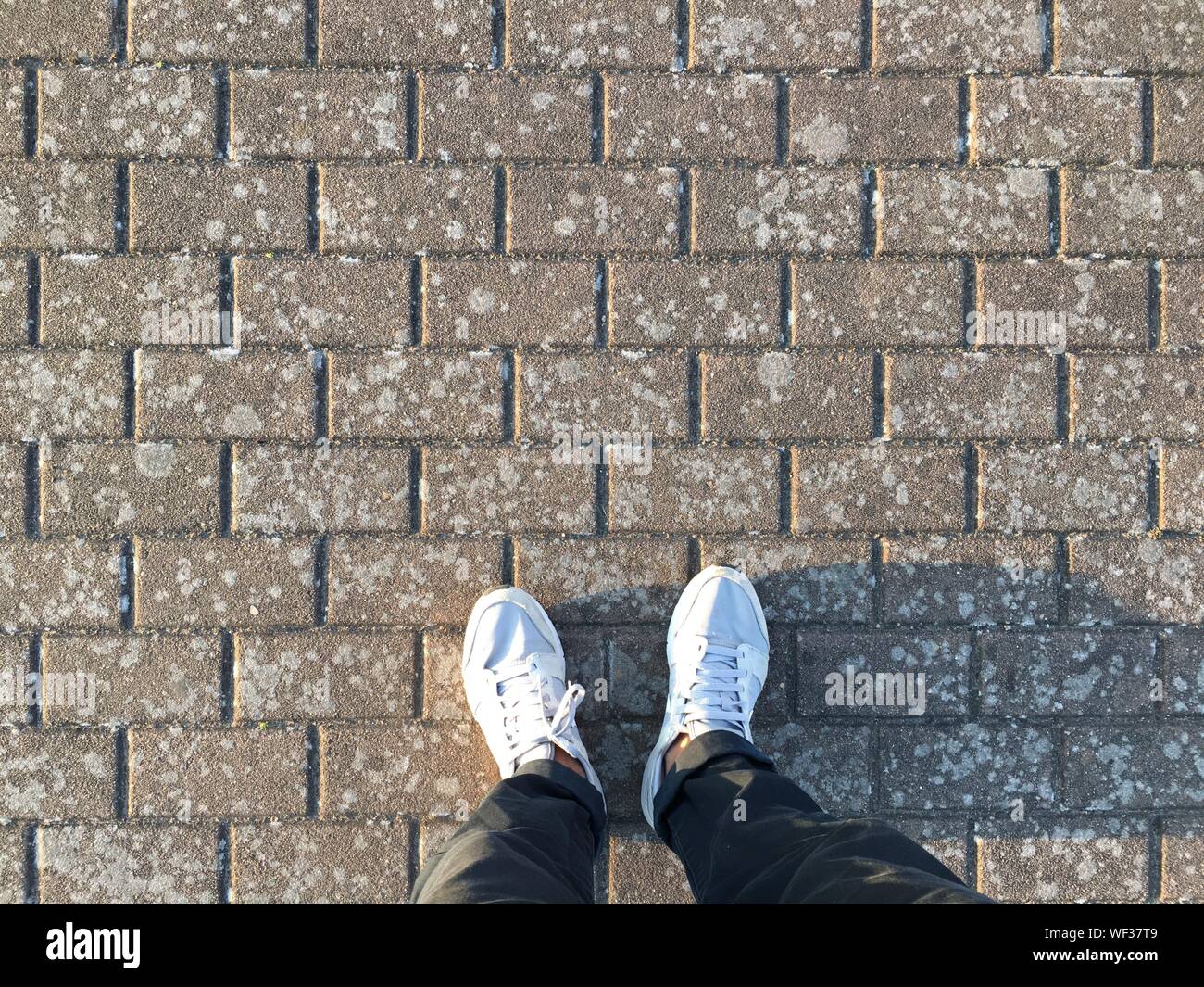 One foot on pavement hi-res stock photography and images - Alamy