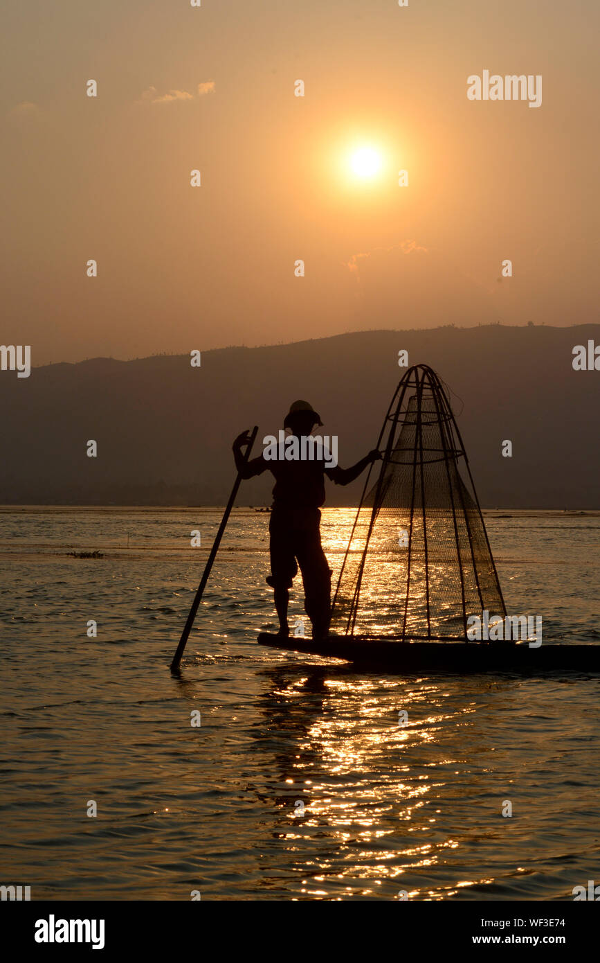 Man floating water silhouette hi-res stock photography and images - Alamy