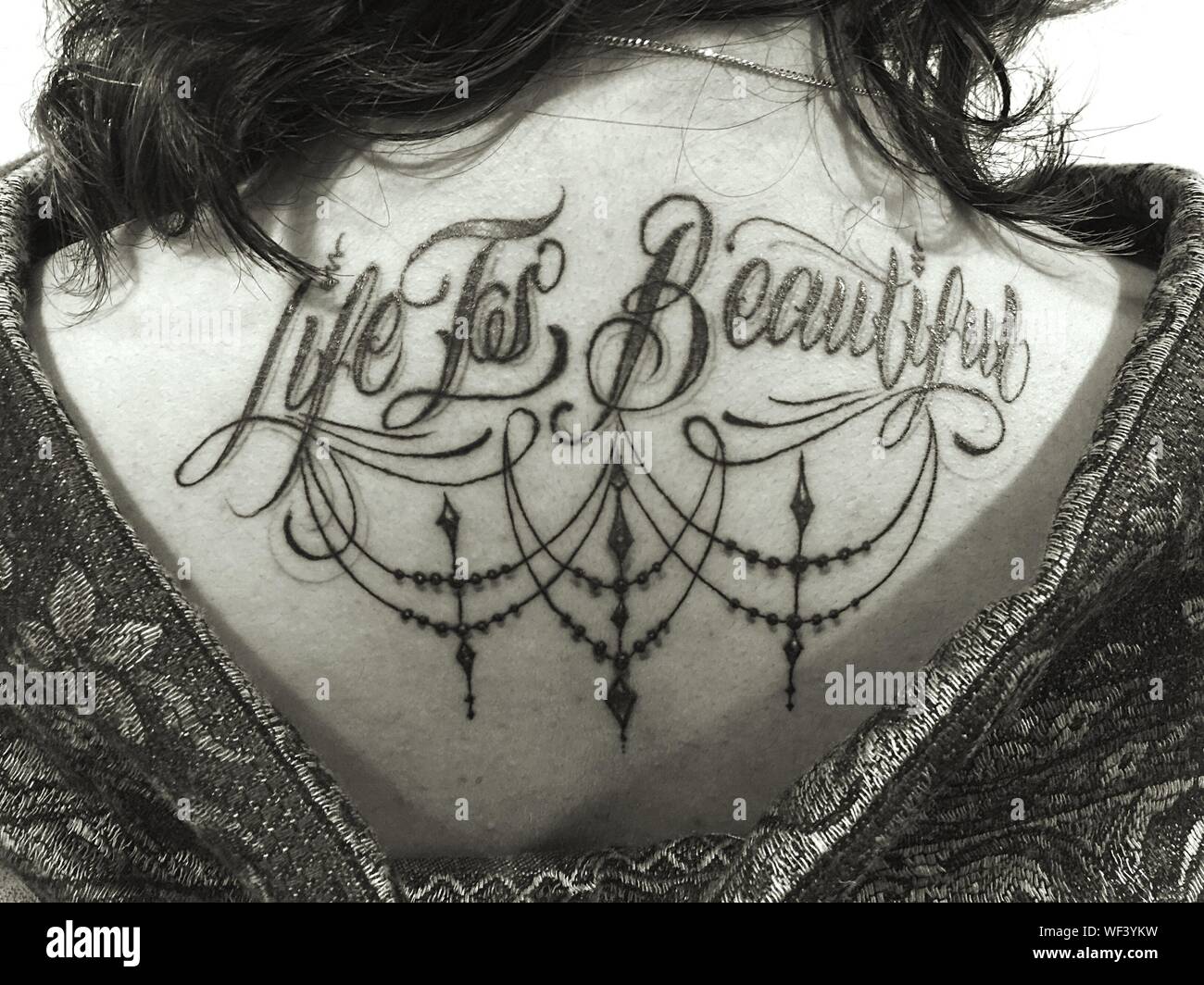 Back tattoo hi-res stock photography and images - Alamy