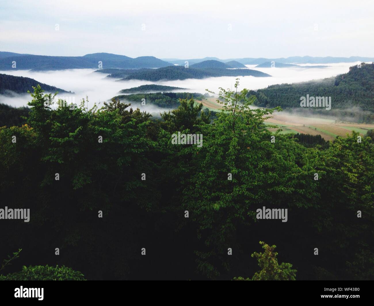 Aerial View Of Fog Over Mountains Stock Photo - Alamy