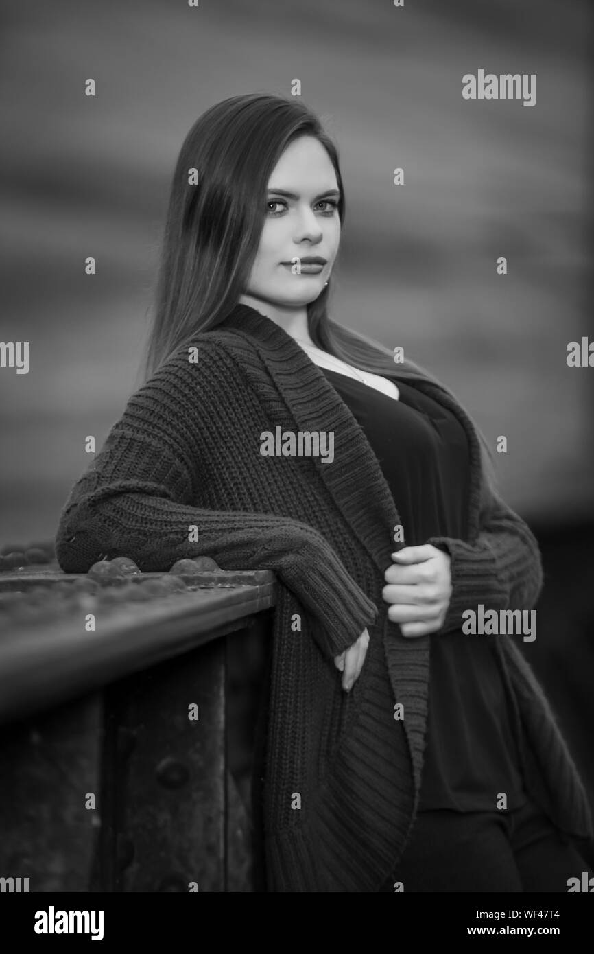 Leaning on bridge railing hi-res stock photography and images - Alamy