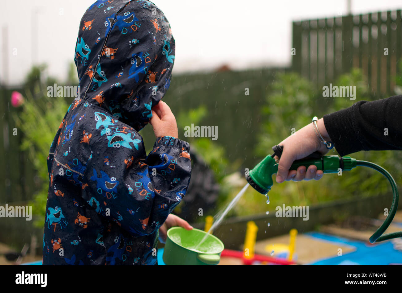 Hose pipe spraying hi-res stock photography and images - Alamy