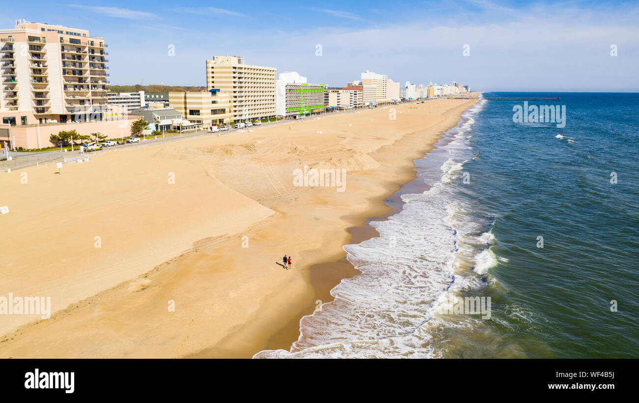 Massive hotels with hundreds of balconies overlook the Atlantic Ocean ...