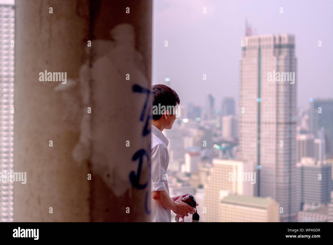 Man Holding Column High Resolution Stock Photography and Images - Alamy