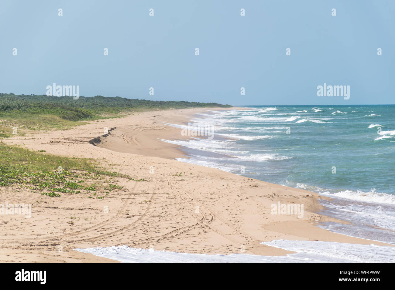 Narrow stretch of sand between the brazilian atlantic ocean and the ...