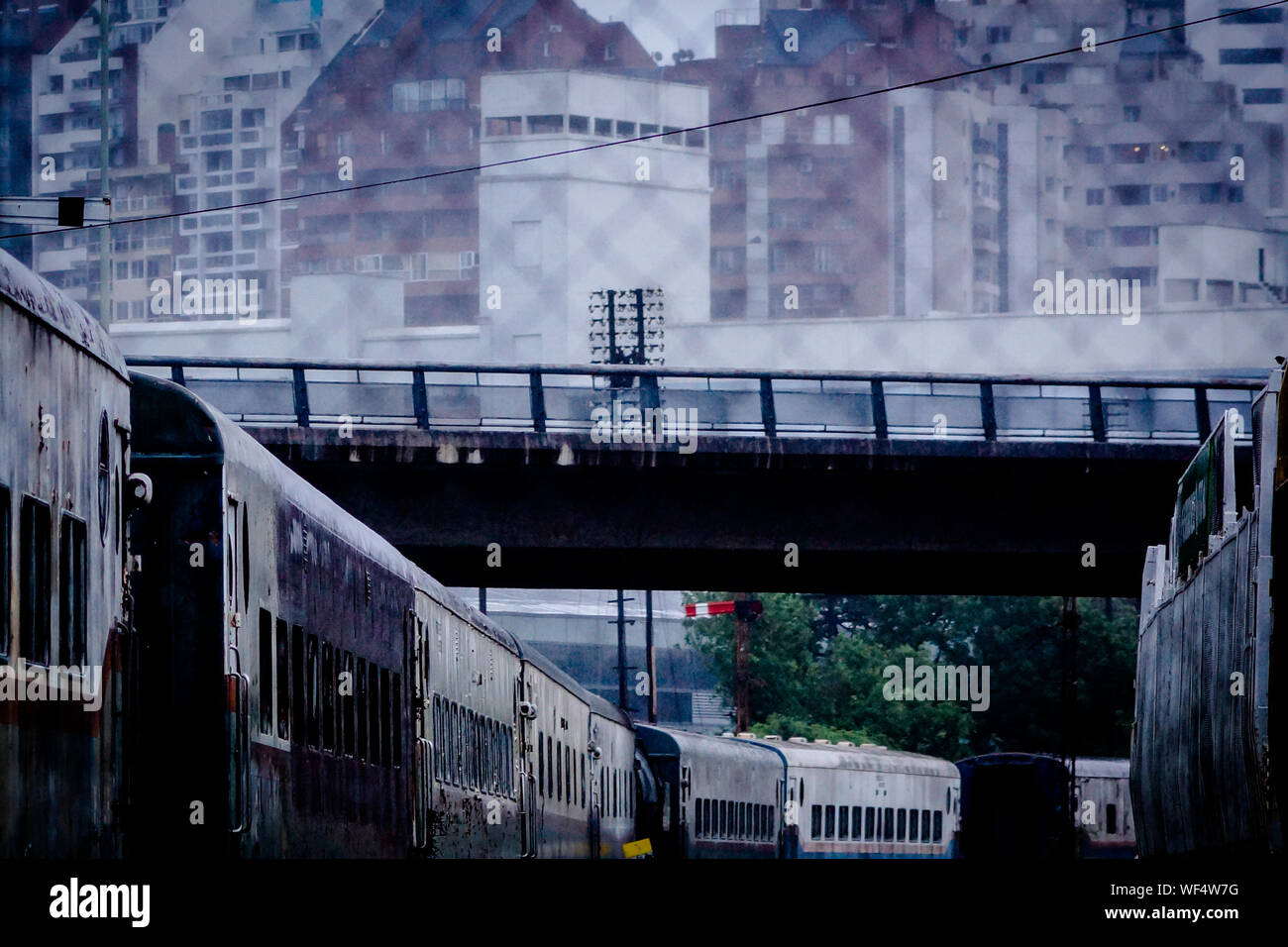 Train passing under the bridge hi-res stock photography and images - Alamy