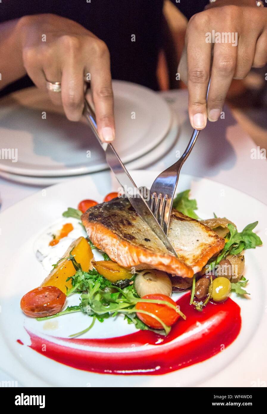 Person eating using fork hi-res stock photography and images - Alamy