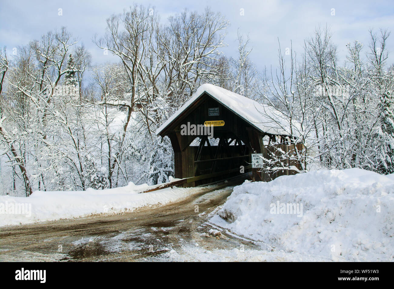 A snow blanketed Emily's covered bridge in Stowe Vermont, USA Stock ...