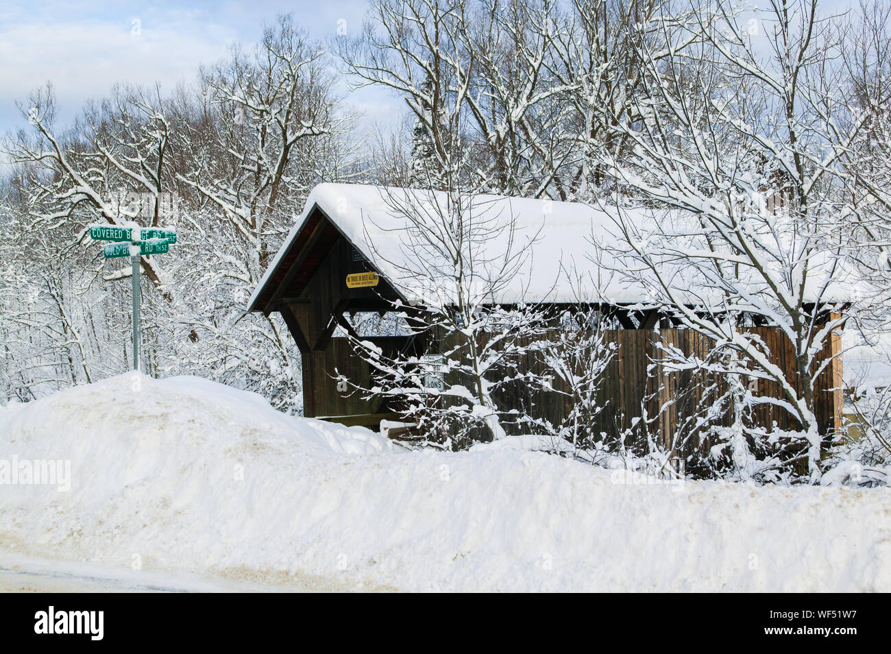 A snow blanketed Emily's covered bridge in Stowe Vermont, USA Stock ...