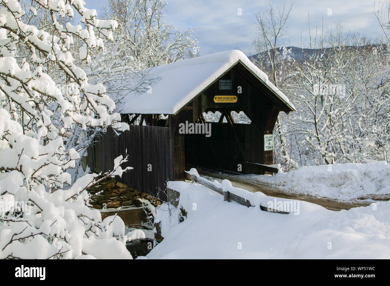 A snow blanketed Emily's covered bridge in Stowe Vermont, USA Stock ...