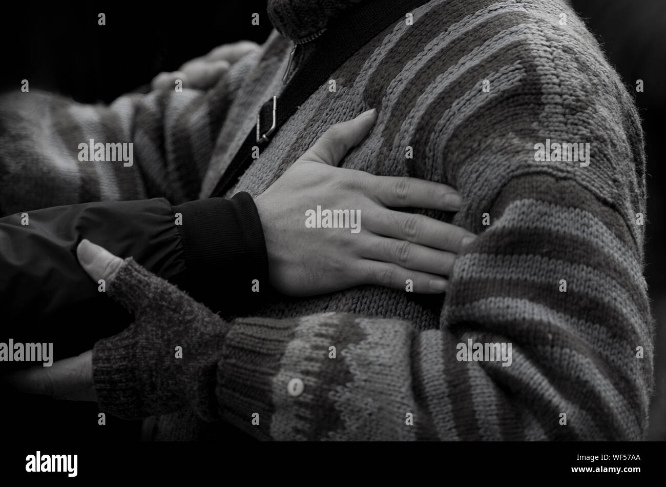 Chest hand hi-res stock photography and images - Alamy