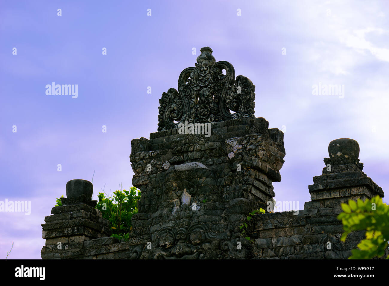 Ancient stone sculpture in the Balinese Stock Photo - Alamy