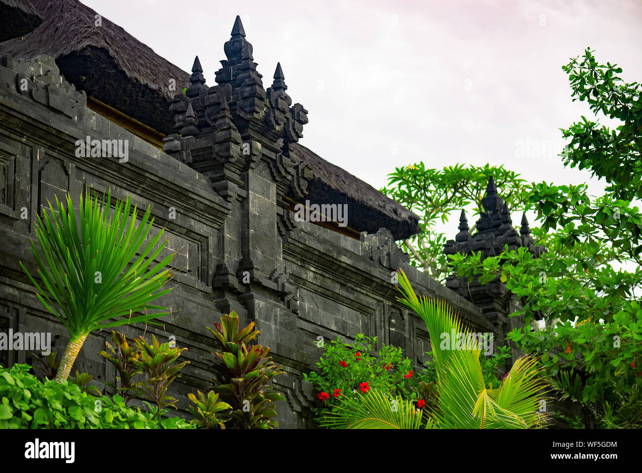 Ancient stone sculpture in the Balinese Stock Photo - Alamy