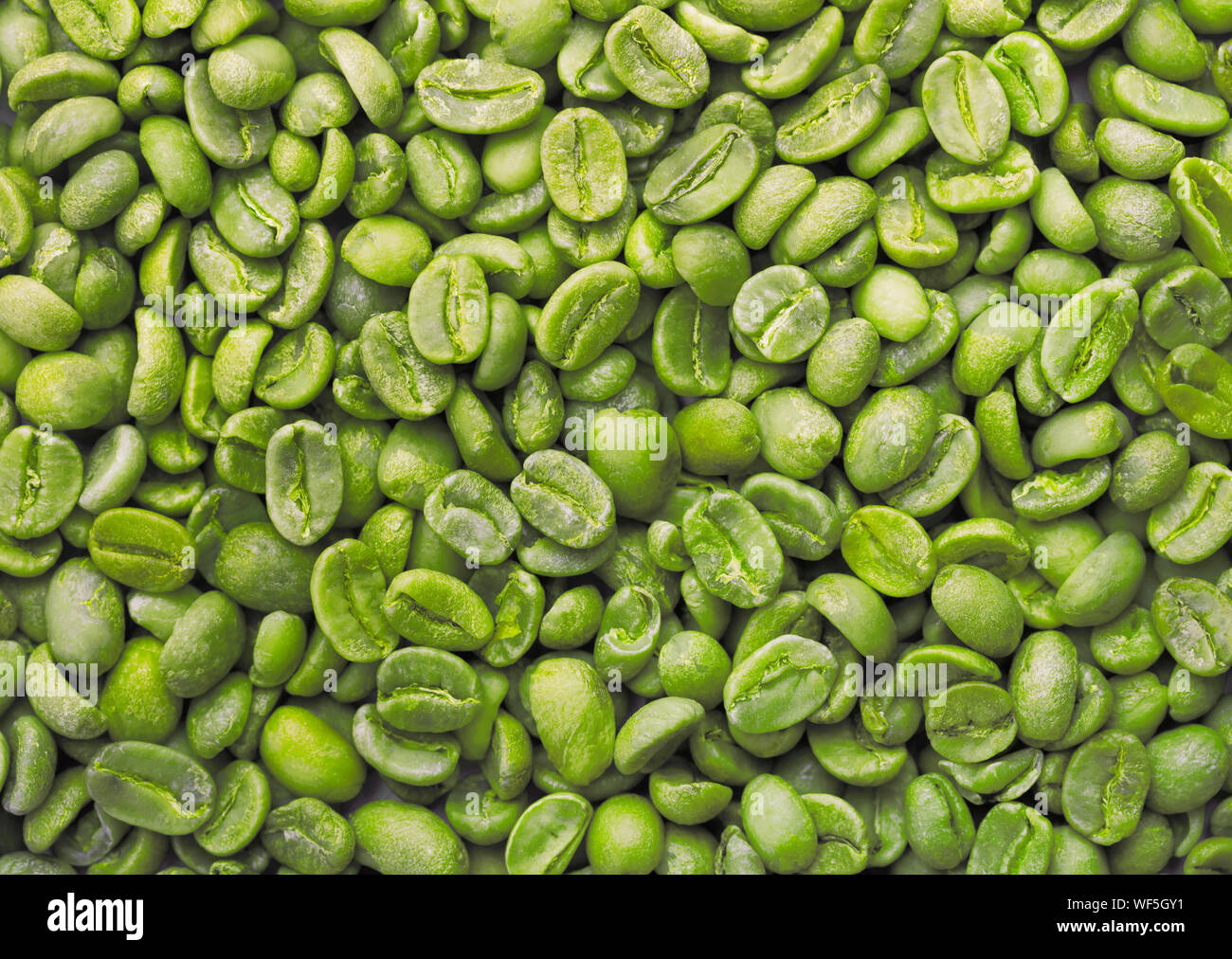 Green coffee beans Stock Photo - Alamy