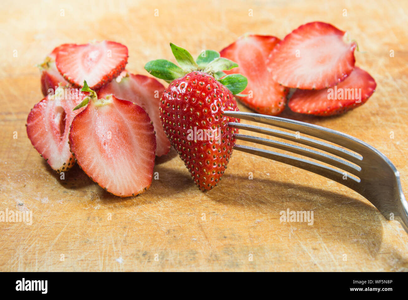 Fork strawberry hi-res stock photography and images - Alamy