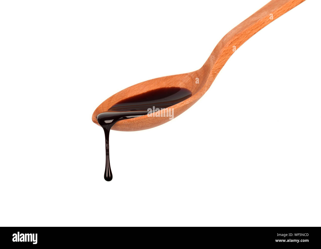 Sticky Syrup Dripping From Spoon Stock Photos & Sticky Syrup Dripping ...