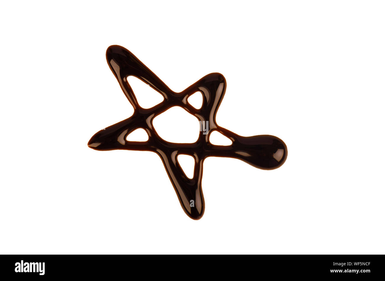Chocolate syrup drop isolated on white background. Star of chocolate ...