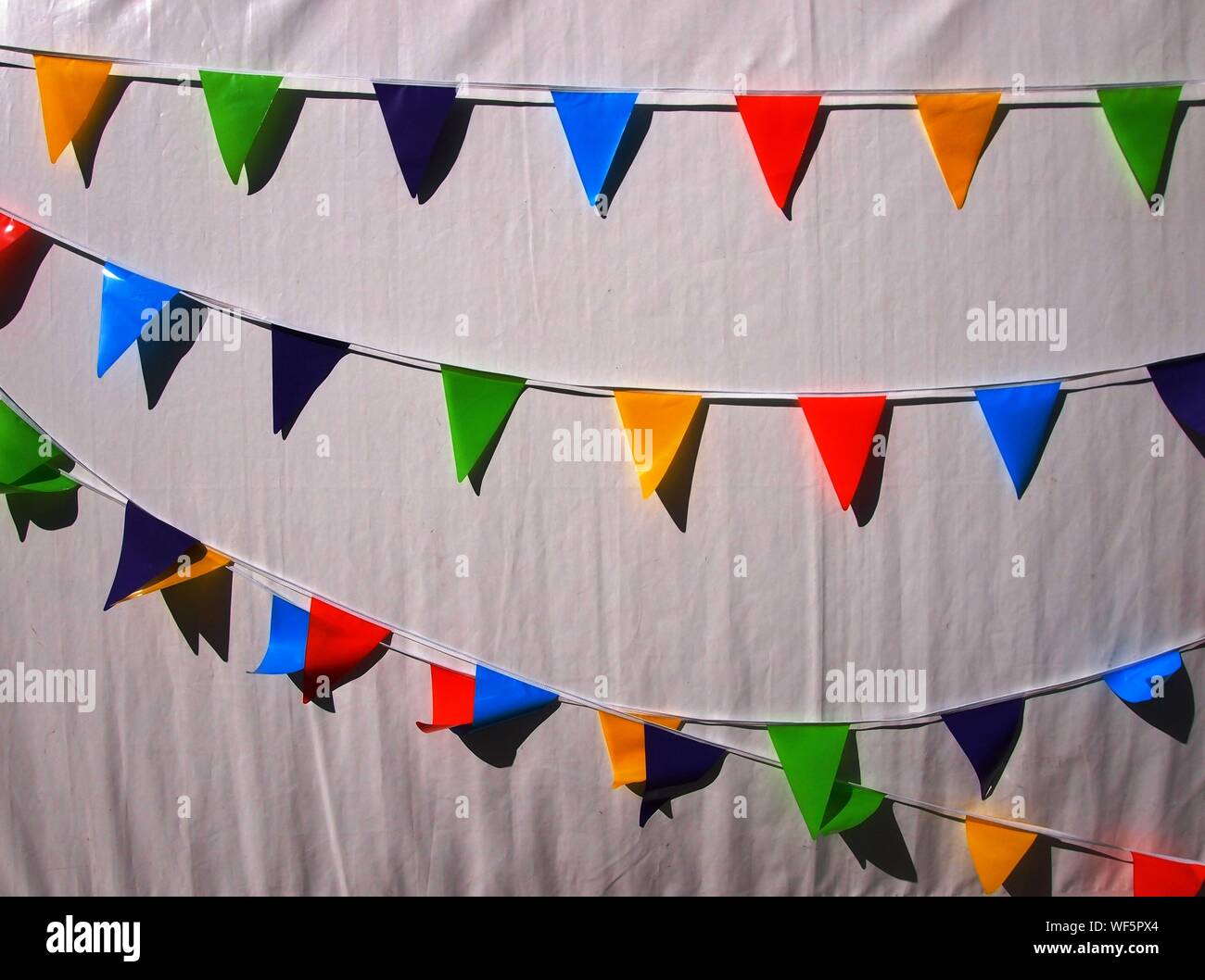 Flags hanging up hi-res stock photography and images - Alamy