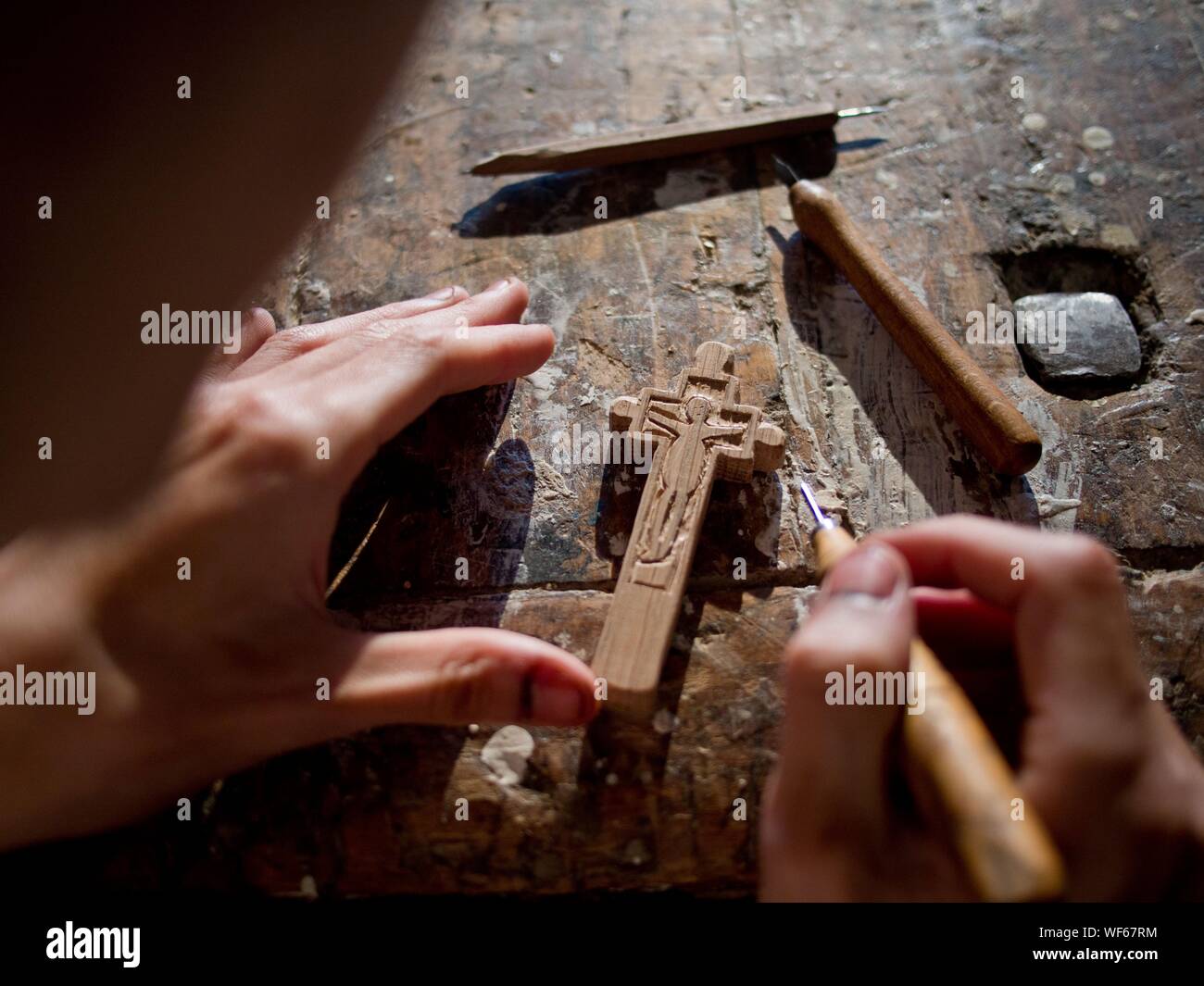 Holding wooden cross hi-res stock photography and images - Alamy