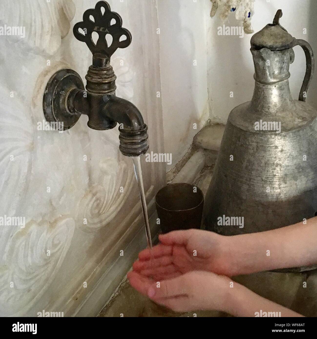 Hand Under Tap High Resolution Stock Photography and Images - Alamy