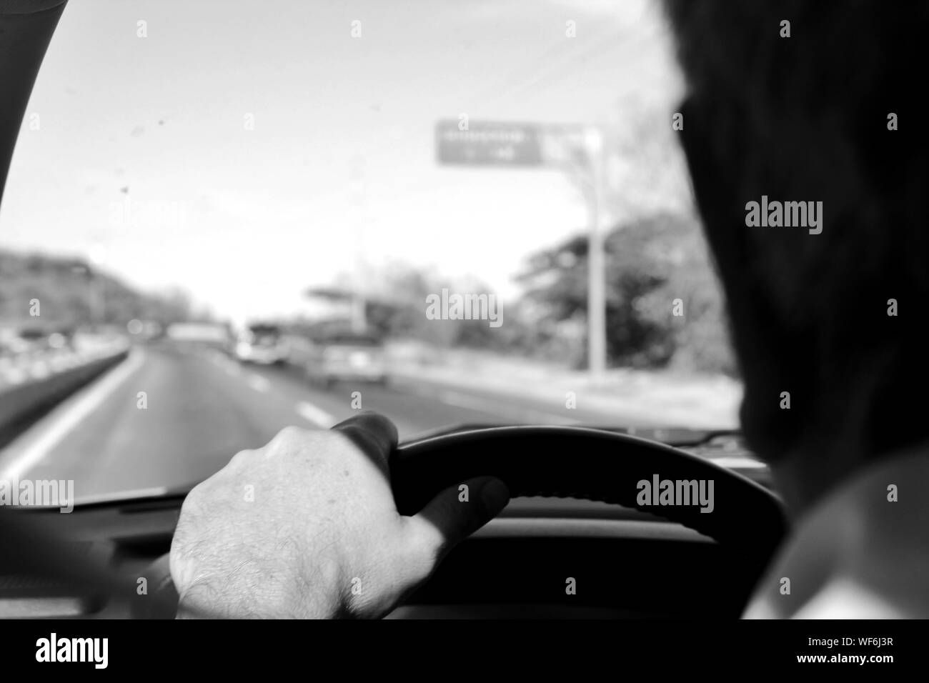 Person driving car Black and White Stock Photos & Images - Alamy