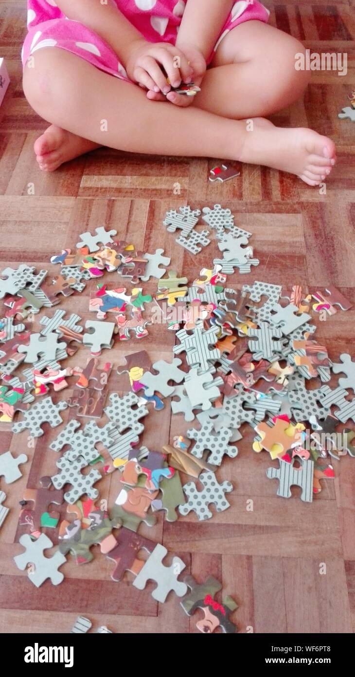 Child jigsaw hi-res stock photography and images - Alamy