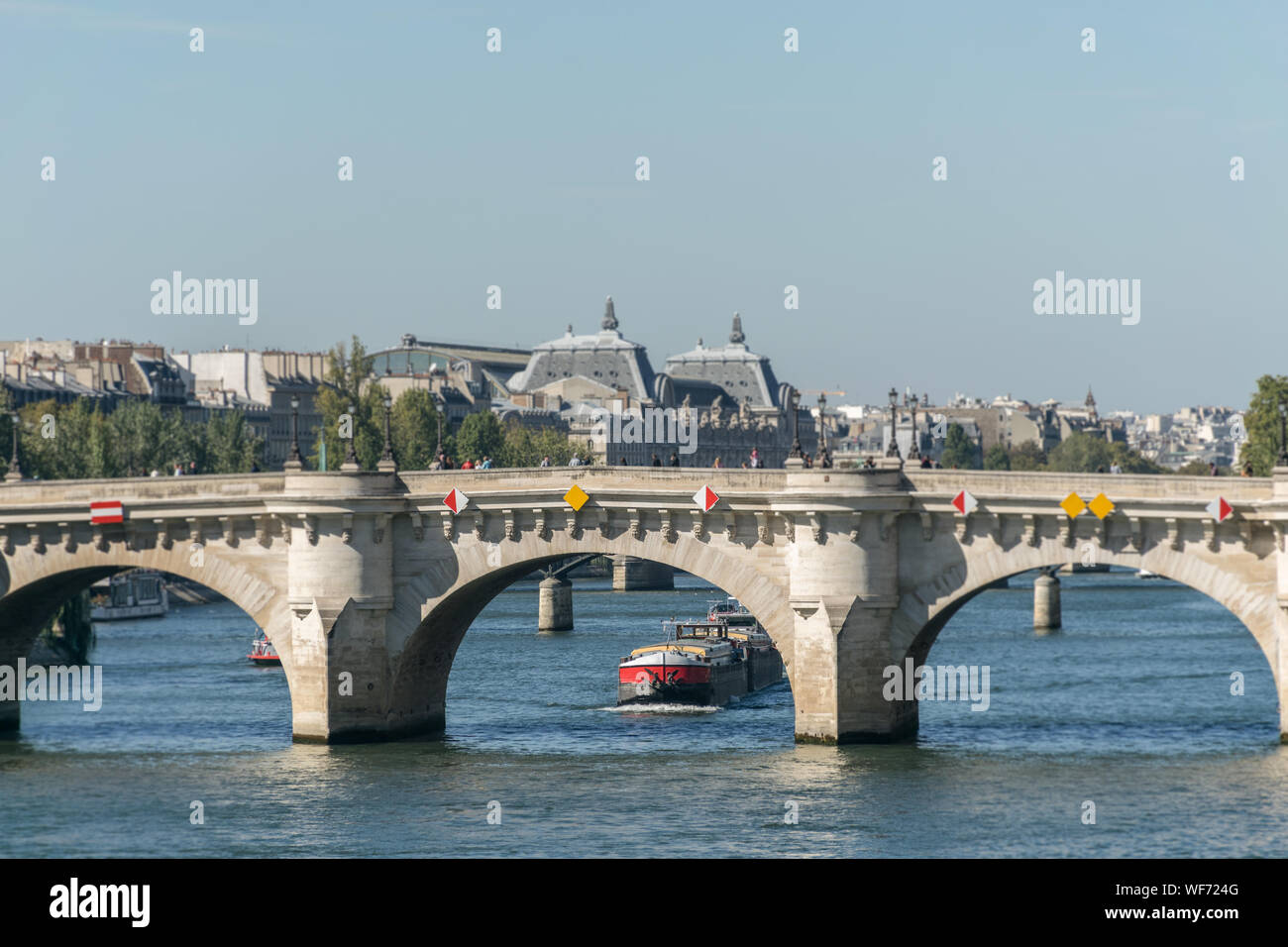 Overview of the architecture of a white bridge with yellow and red ...
