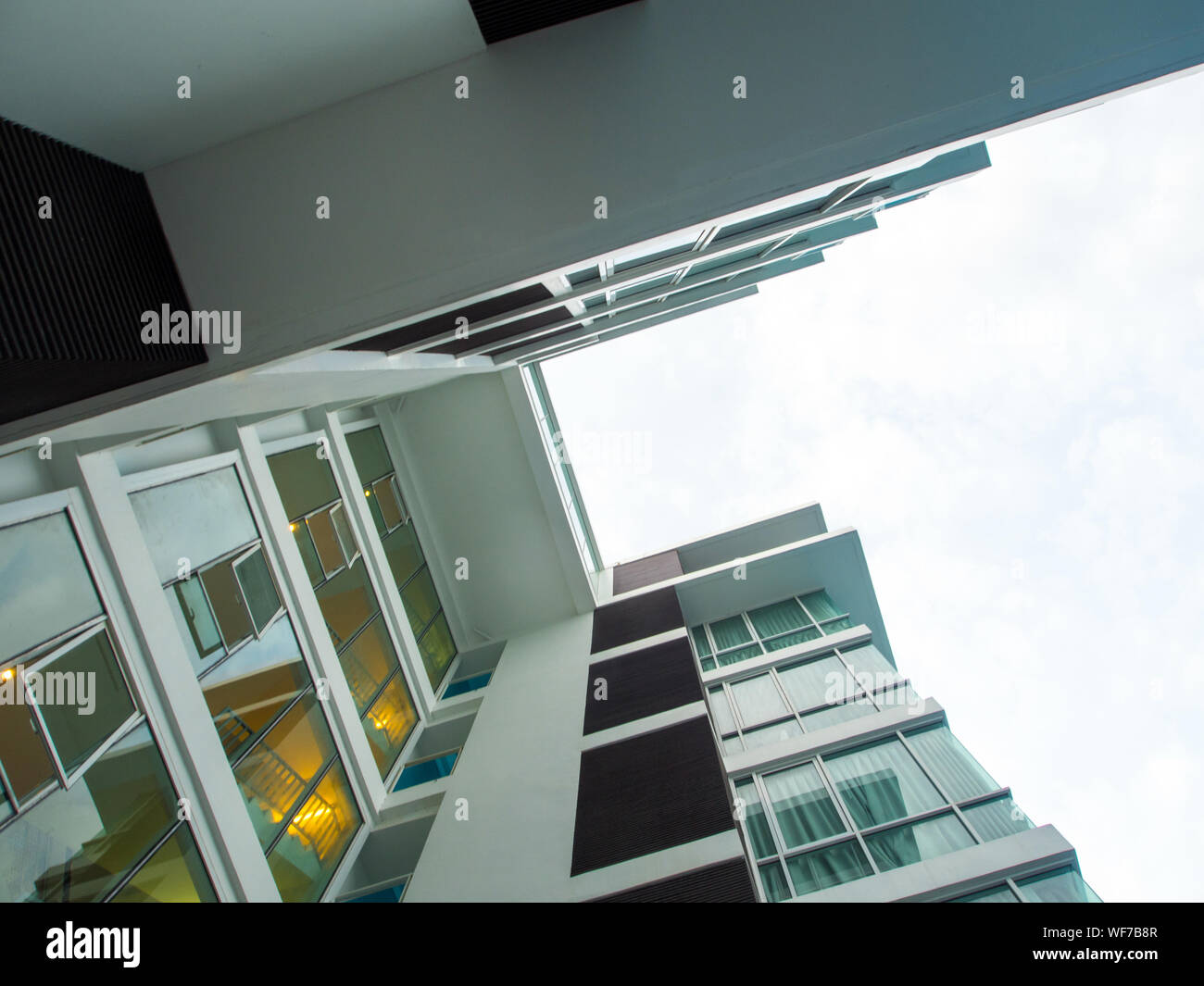 A Low Vantage Point to the high rise building, Looking up to the sky ...