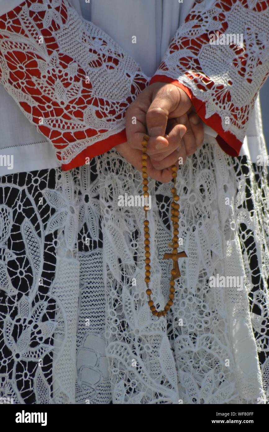 The rosary priest hi-res stock photography and images - Alamy